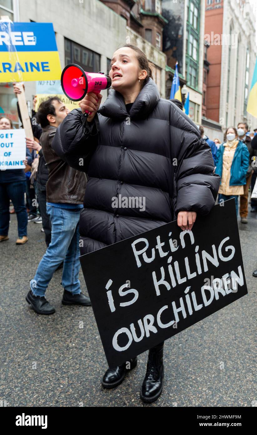 March 6, 2022. Boston, MA. People marched down Boylston Street in ...