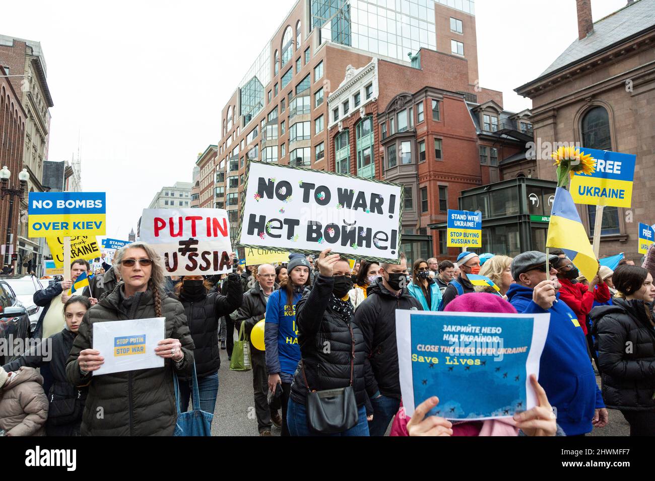 March 6, 2022. Boston, MA. People marched down Boylston Street in ...