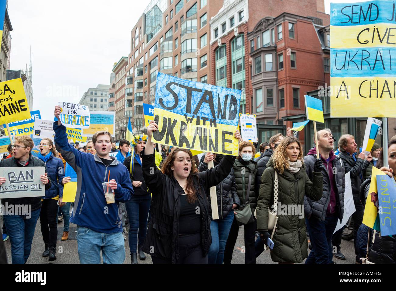 March 6, 2022. Boston, MA. People marched down Boylston Street in ...