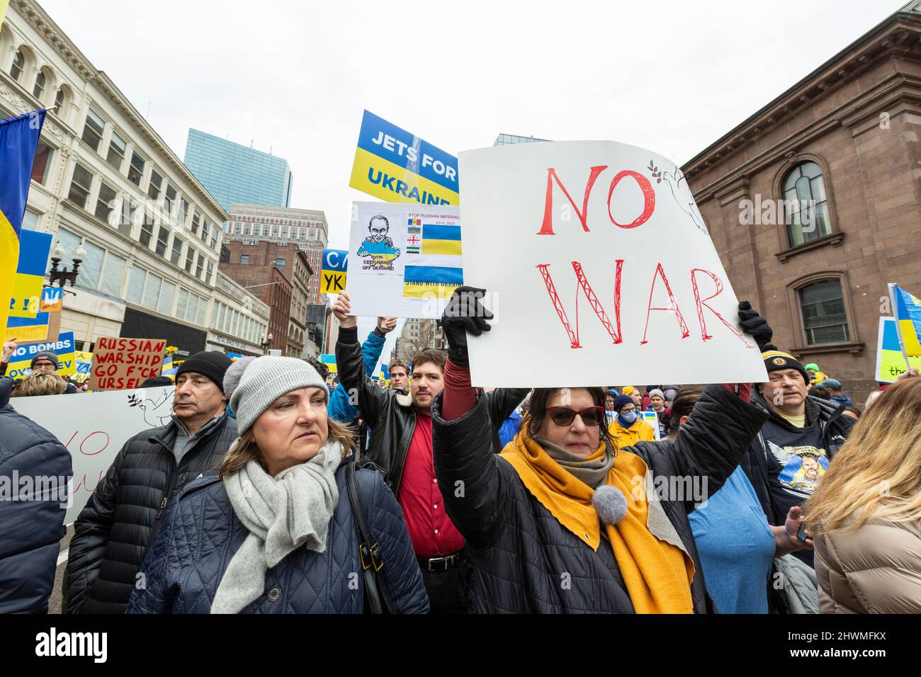 March 6, 2022. Boston, MA. People marched down Boylston Street in ...