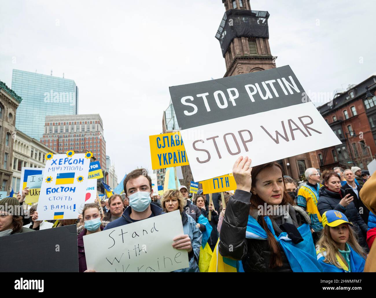 March 6, 2022. Boston, MA. People marched down Boylston Street in ...