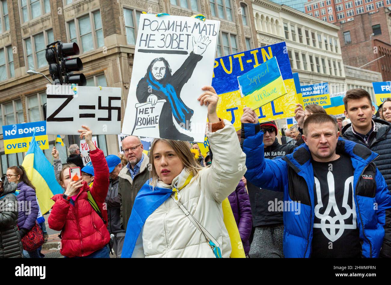 March 6, 2022. Boston, MA. People marched down Boylston Street in ...