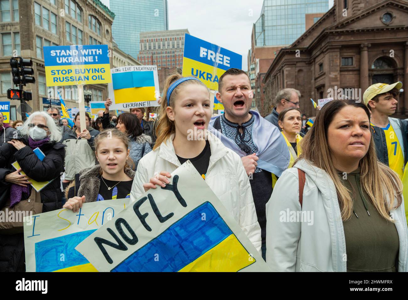 March 6, 2022. Boston, MA. People marched down Boylston Street in ...