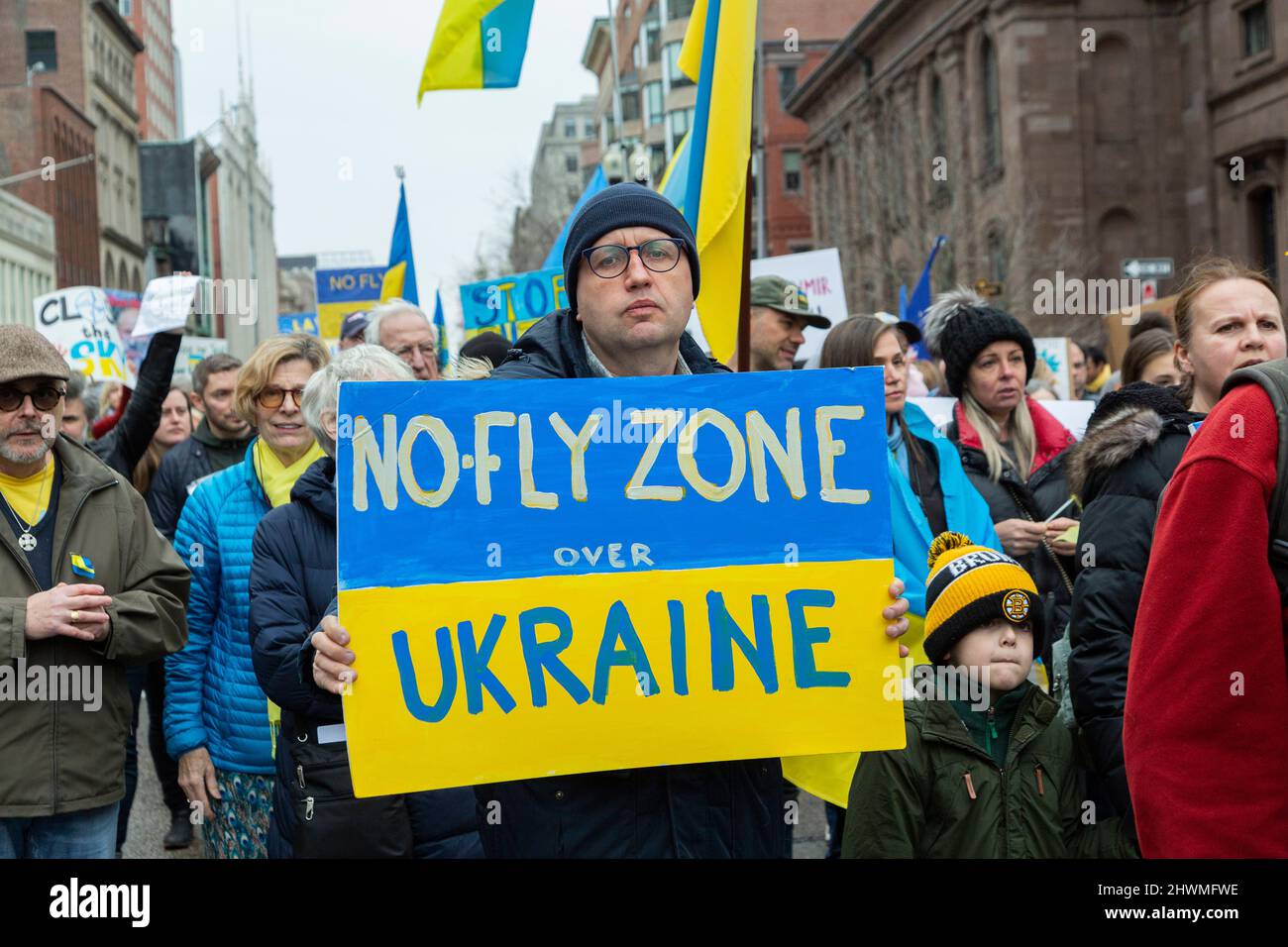 March 6, 2022. Boston, MA. People marched down Boylston Street in ...