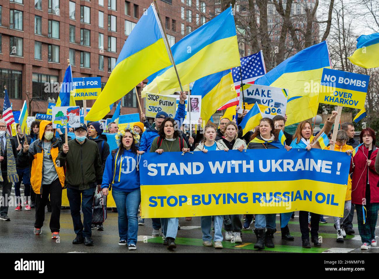 March 6, 2022. Boston, MA. People marched down Boylston Street in ...