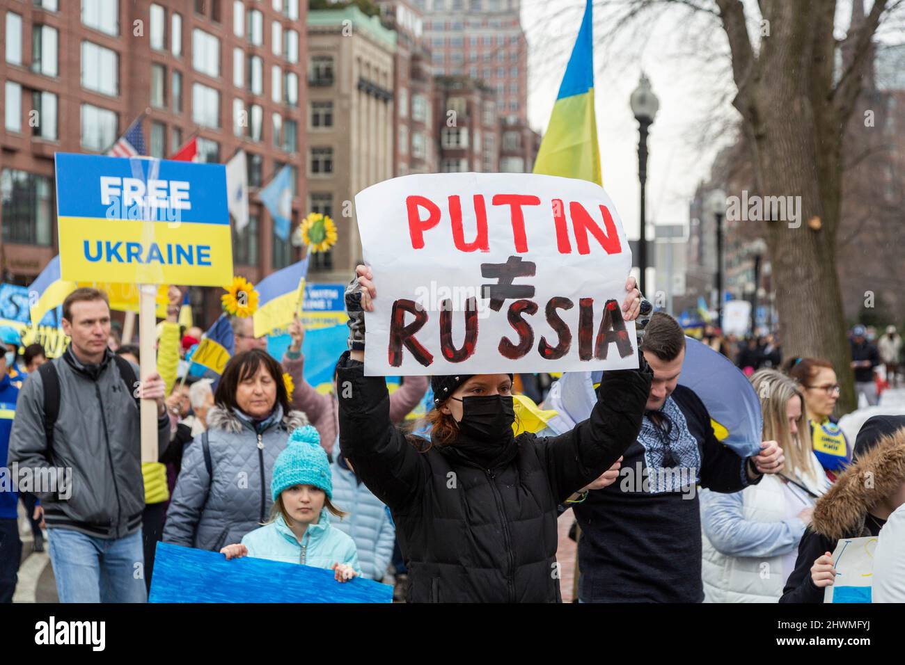 March 6, 2022. Boston, MA. People marched down Boylston Street in ...