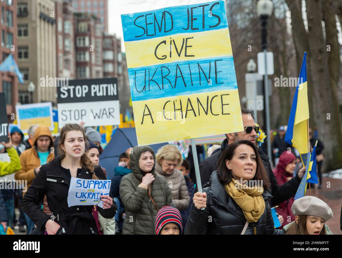 March 6, 2022. Boston, MA. People marched down Boylston Street in ...