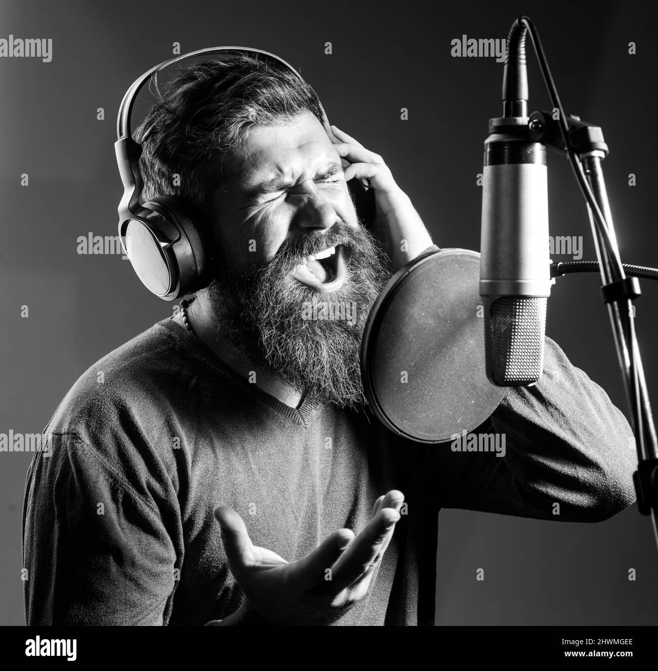 Man singing in recording studio Black and White Stock Photos & Images ...