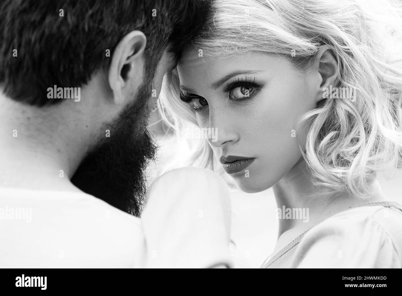 Young couple care. Sensual couple. Young couple in love hug each other ...