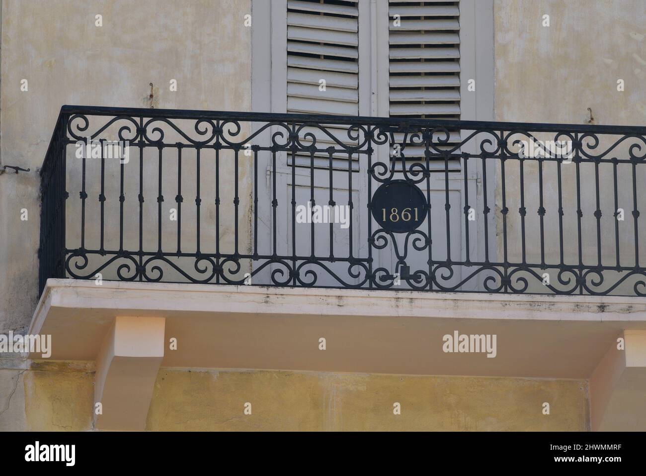 Old Neoclassical house facade with an antique wooden window and a ...
