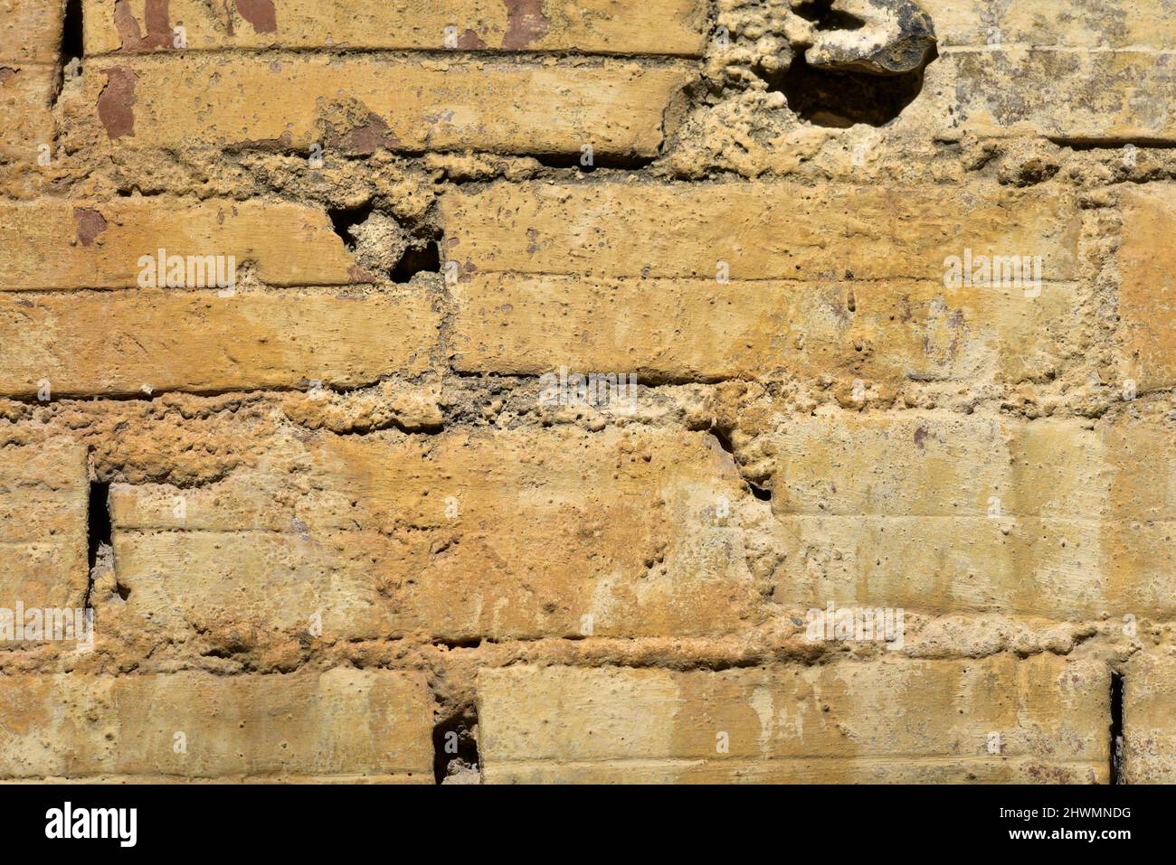 Old weathered brick wall with cement mortar in Nafplio, Greece Stock ...