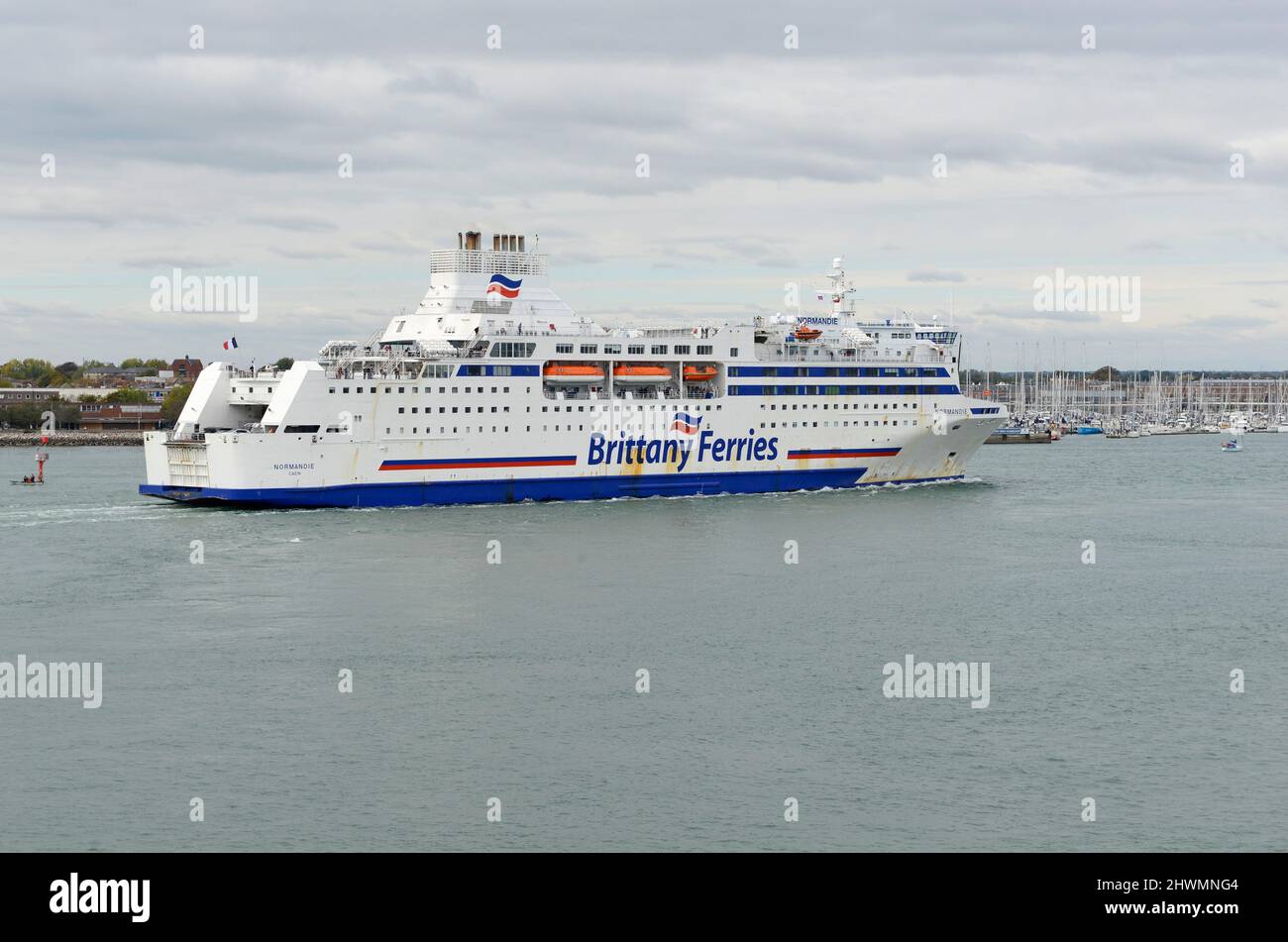 A Brittany ferries vessel sails towards the dock in Portsmouth, UK ...