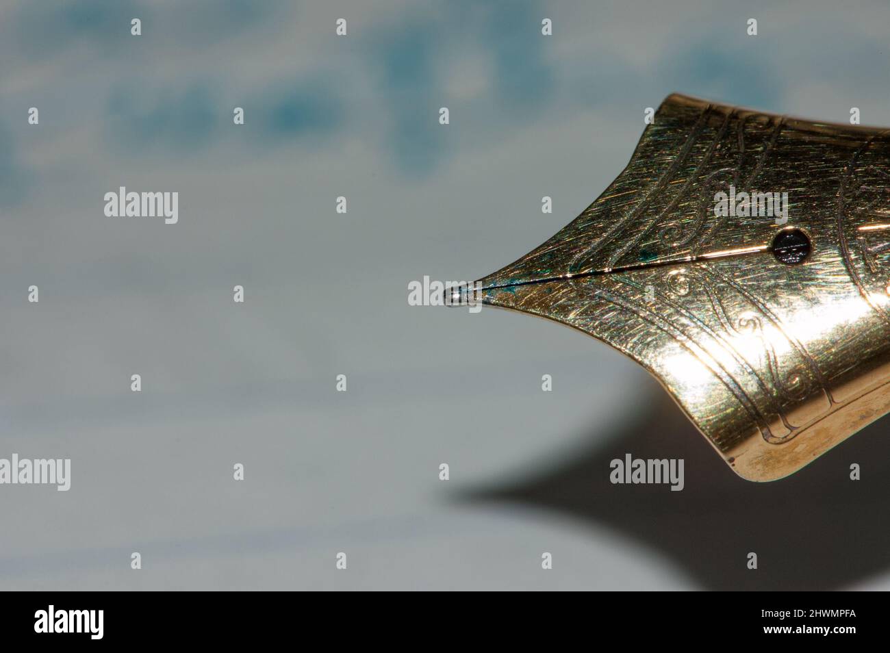 Japanese made Platinum pen nib after writing in blue ink Stock Photo ...