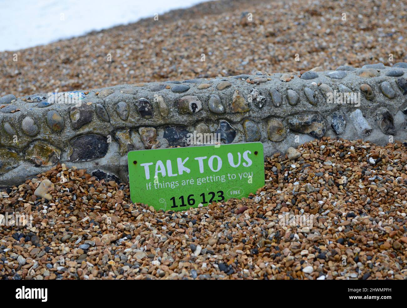 A Samaritans sign on the beach at Brighton, East Sussex, UK Stock Photo ...