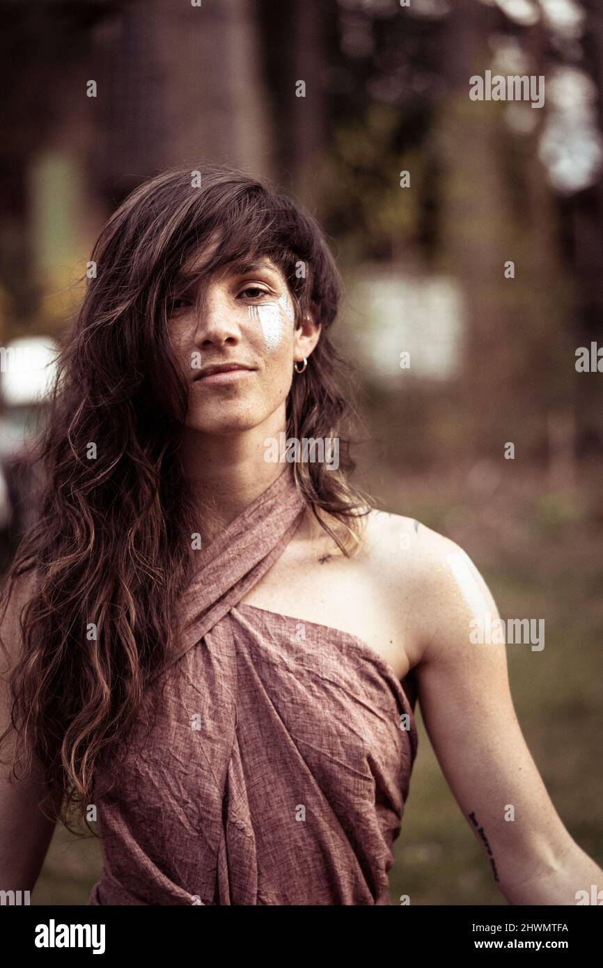 portrait of strong alternative tattooed woman with facepaint Stock ...