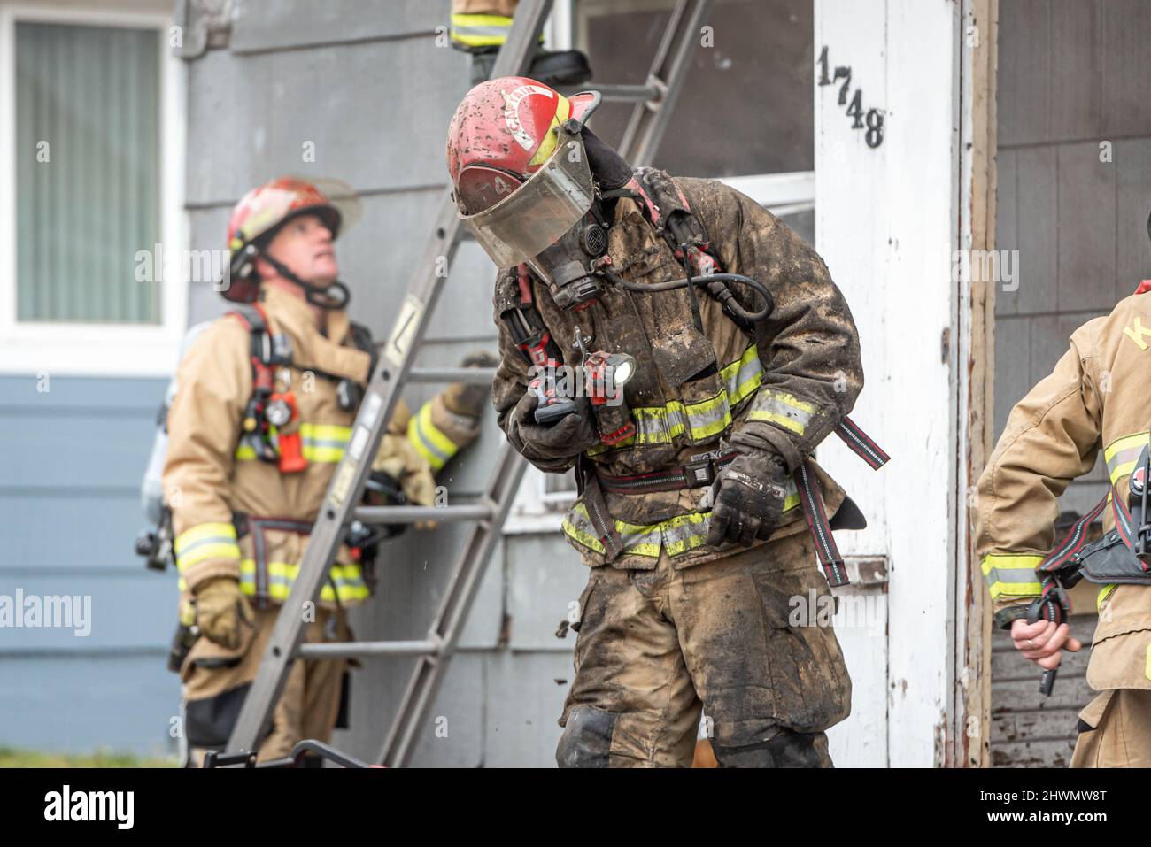 Firefighters work on extinguishing a structure fire Stock Photo - Alamy