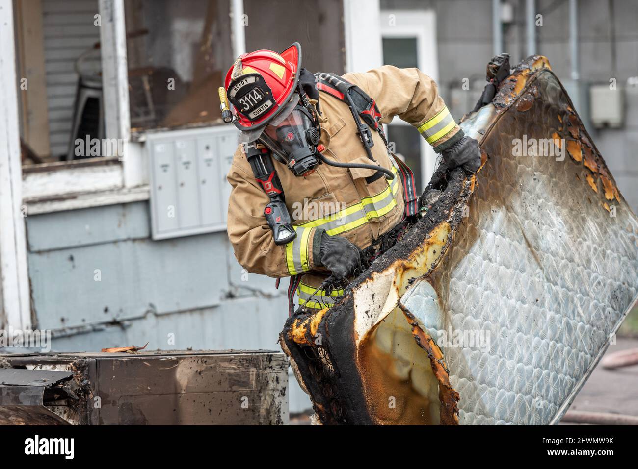Firefighters work on extinguishing a structure fire Stock Photo - Alamy