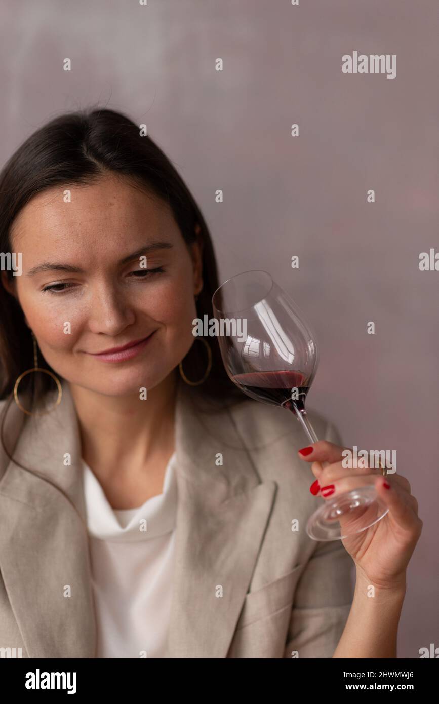 Hand on wine glass woman hi-res stock photography and images - Alamy
