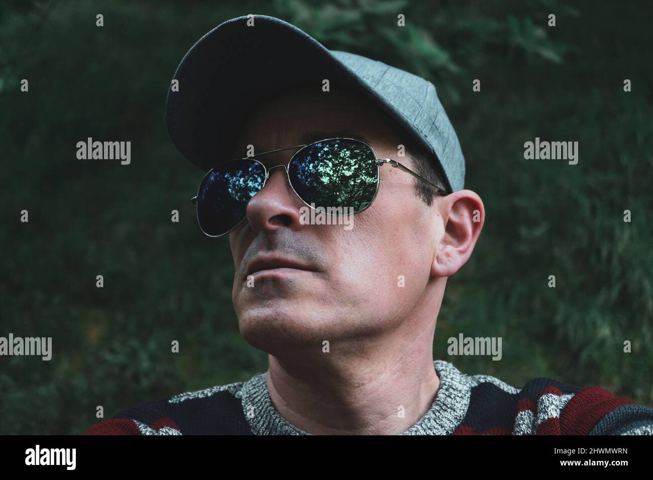 man with sunglasses and cap portrait Stock Photo - Alamy