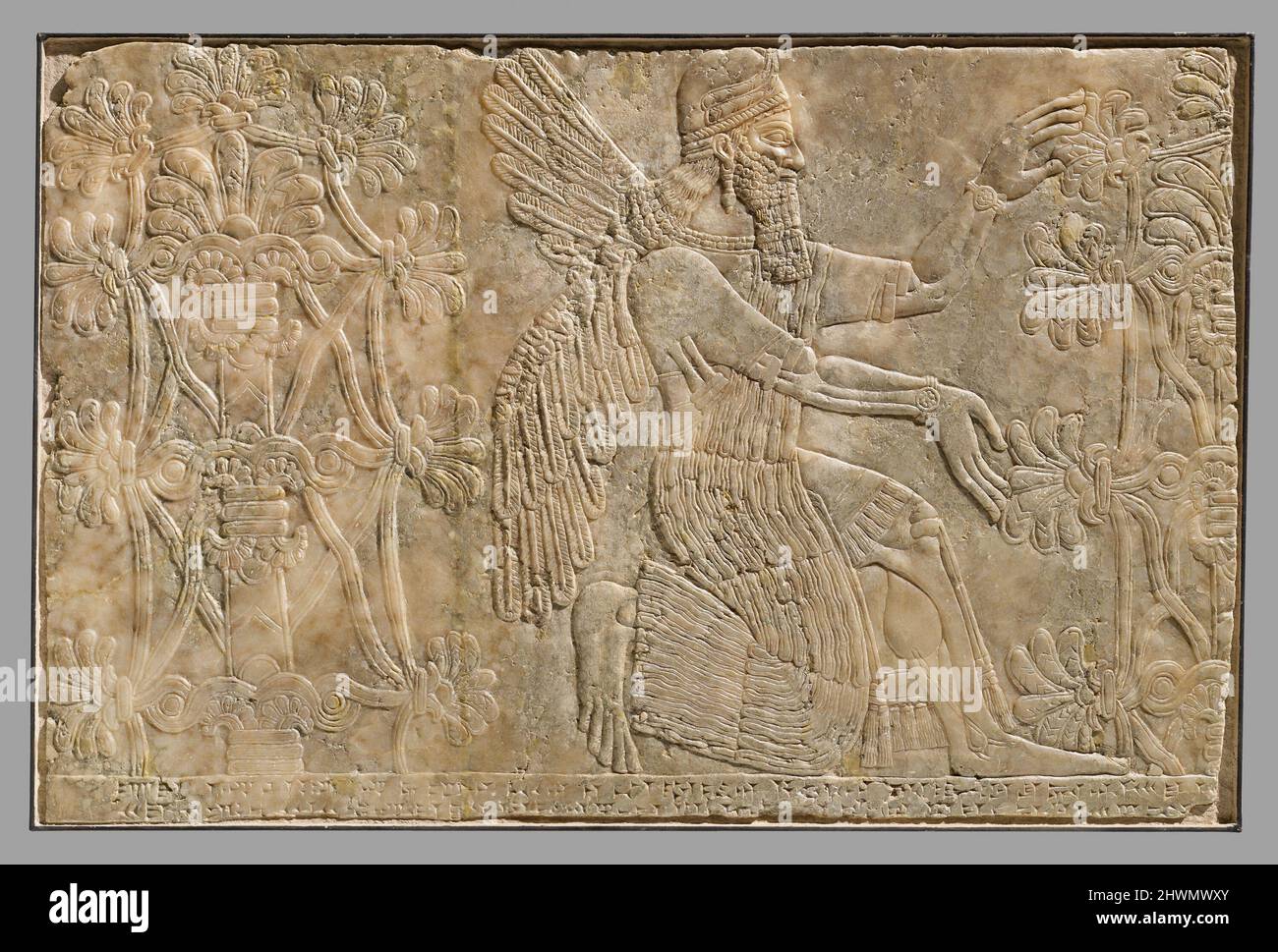 Relief: Kneeling genie facing right (joins 1854.5 Stock Photo - Alamy