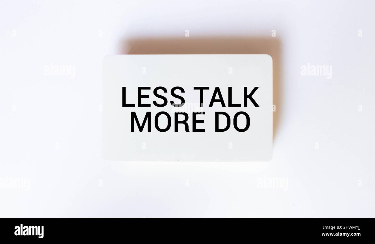 Less Talk more Do, written on a sticky note Stock Photo - Alamy