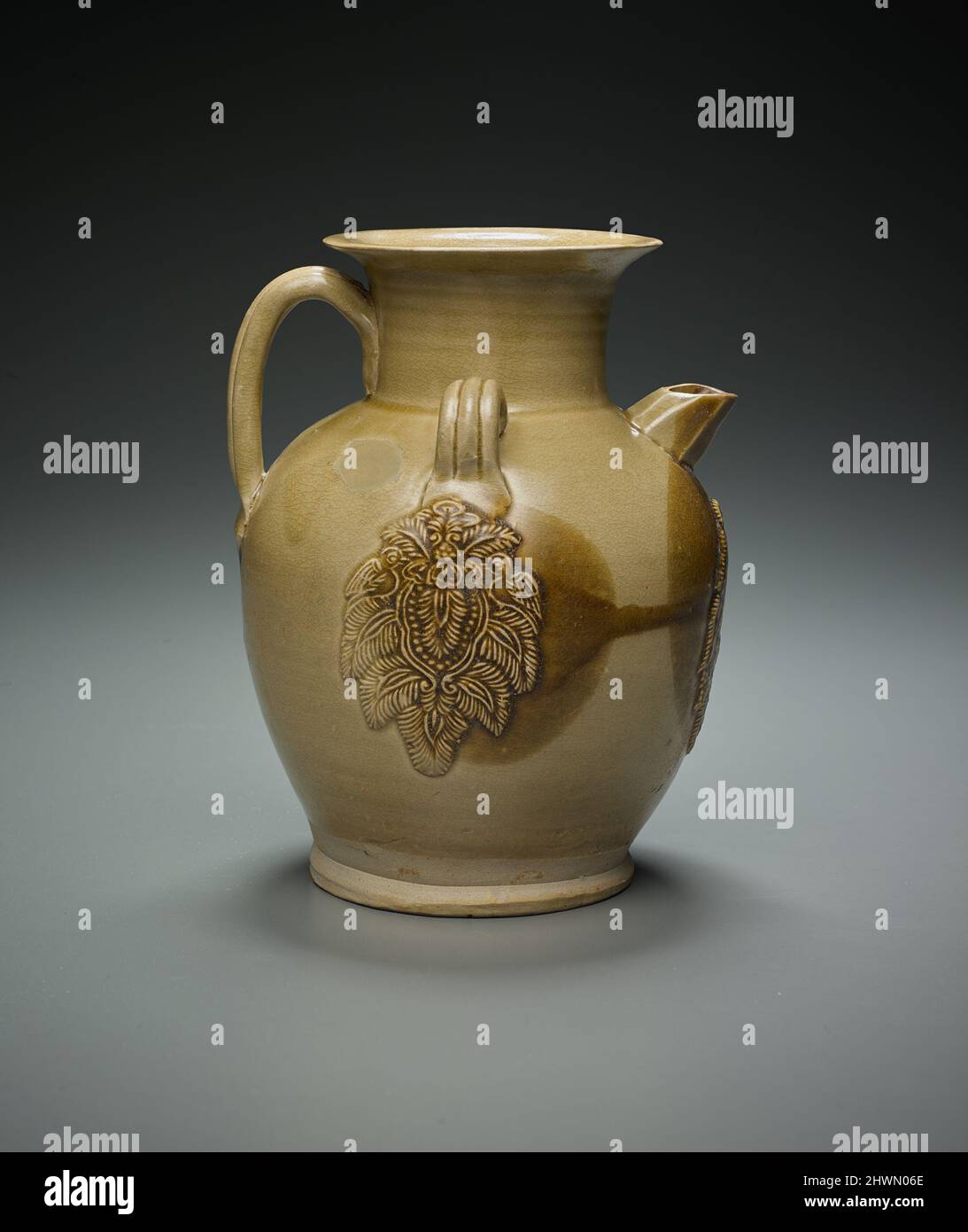 Ewer with Palm Leaves Stock Photo - Alamy