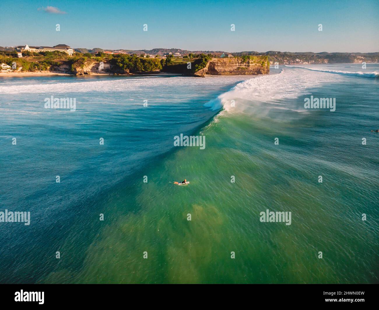Aerial shooting of big waves at sunset. Biggest ocean wave in Bali ...