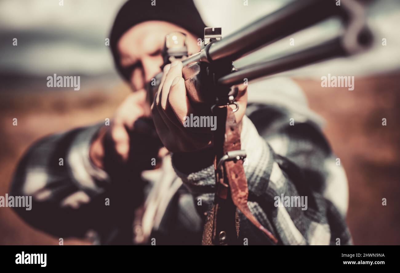 Hunter with shotgun gun on hunt. Closed and open hunting season ...