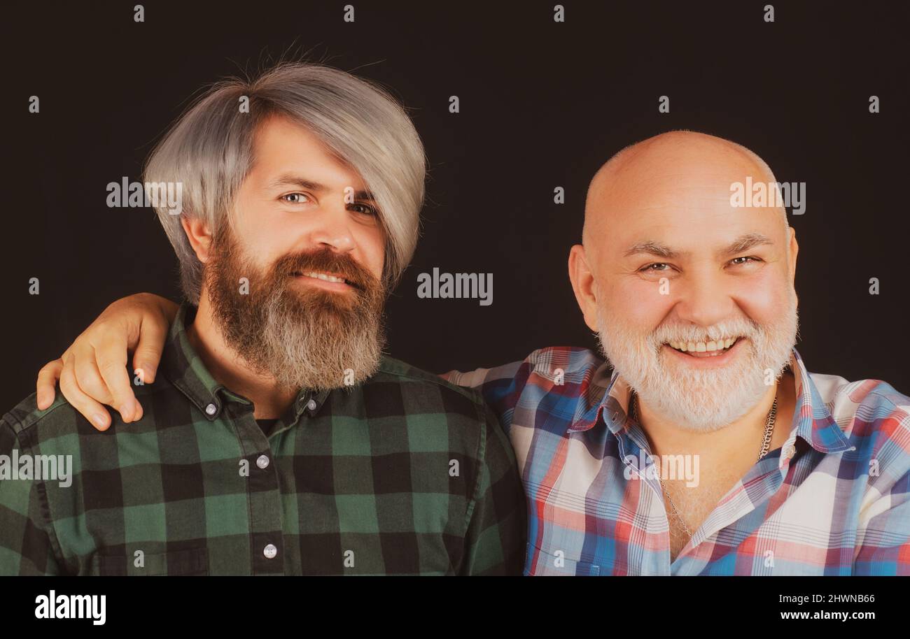 Happy son and old dad. Generation concept. Father and son. Older ...