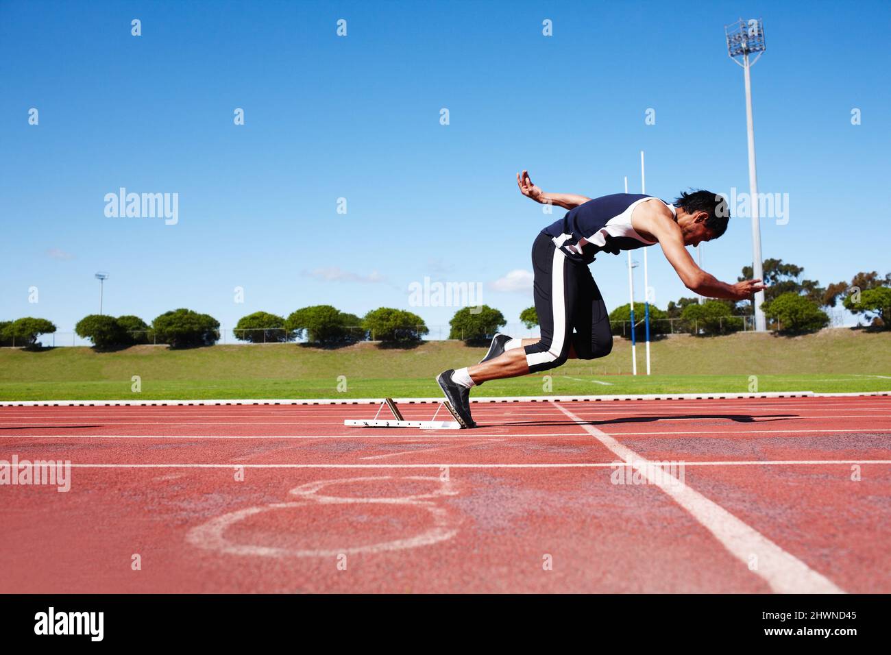 Ready to run. A young athlete ready to run a race Stock Photo - Alamy