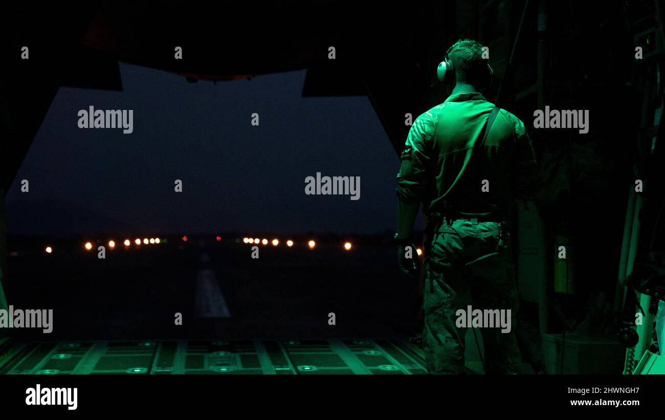 The loadmaster of an MC-130J Commando II multi-mission combat transport ...