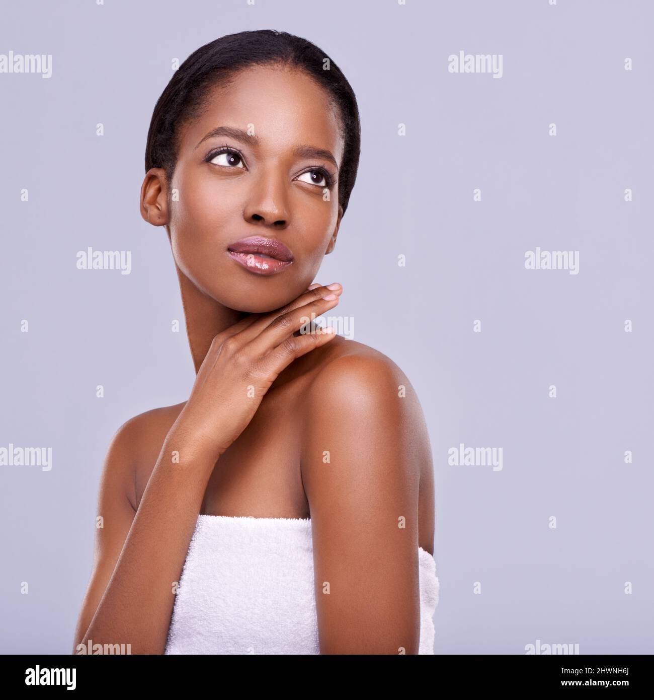 Enhancing her natural beauty. Cropped shot of a beautiful young woman ...