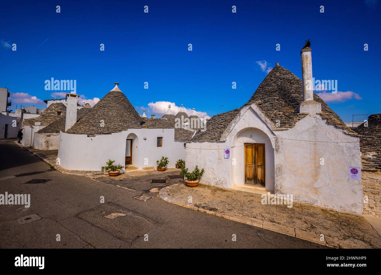 Historic Trulli houses in the city of Alberobello in Italy - a tourist ...