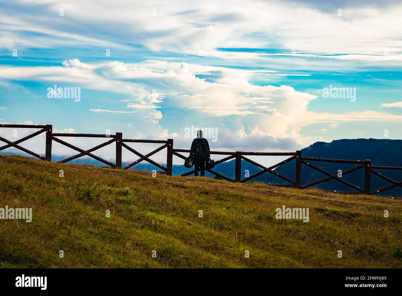 mountain top view with dramatic sky and isolated girl at morning image ...