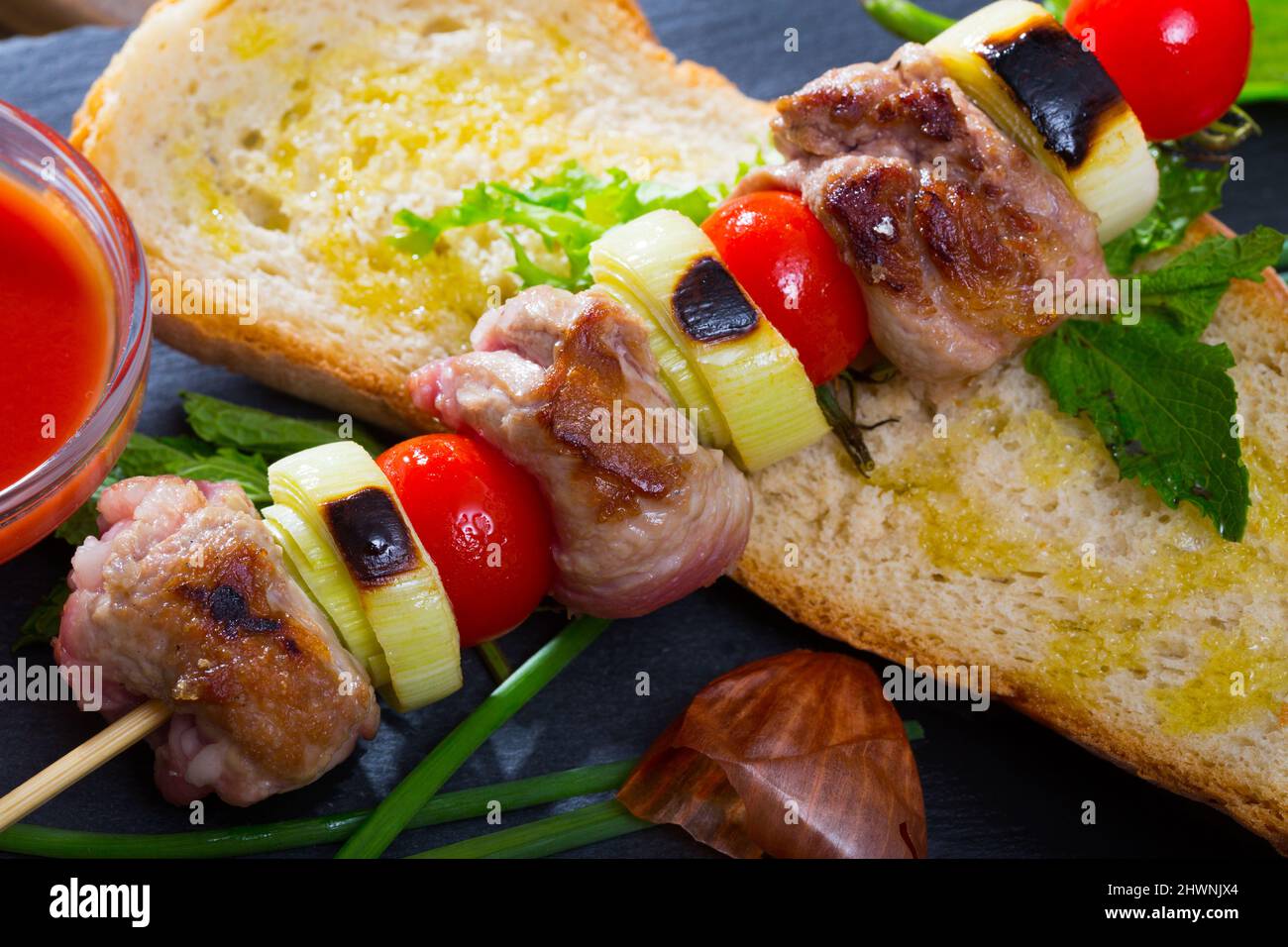 Mutton slices on barbecue skewers (shashlik Stock Photo - Alamy