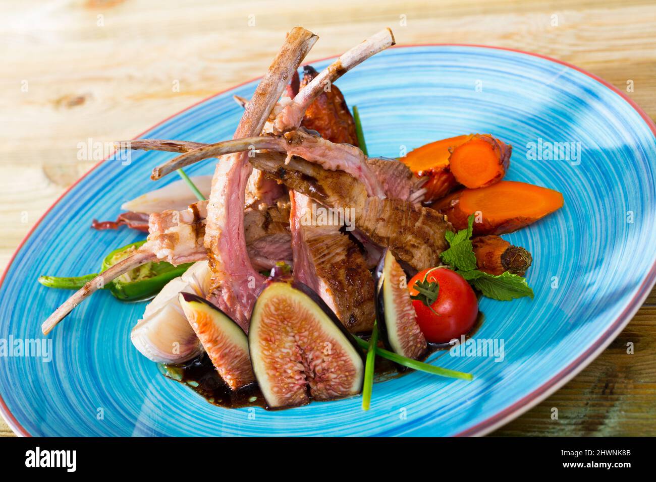 Plate of roasted mutton ribs Stock Photo - Alamy