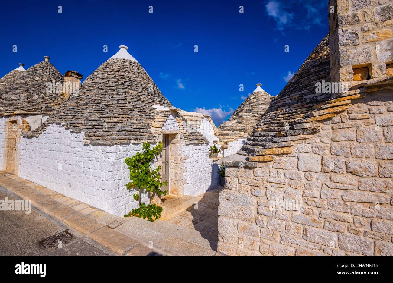 Historic Trulli houses in the city of Alberobello in Italy - a tourist ...