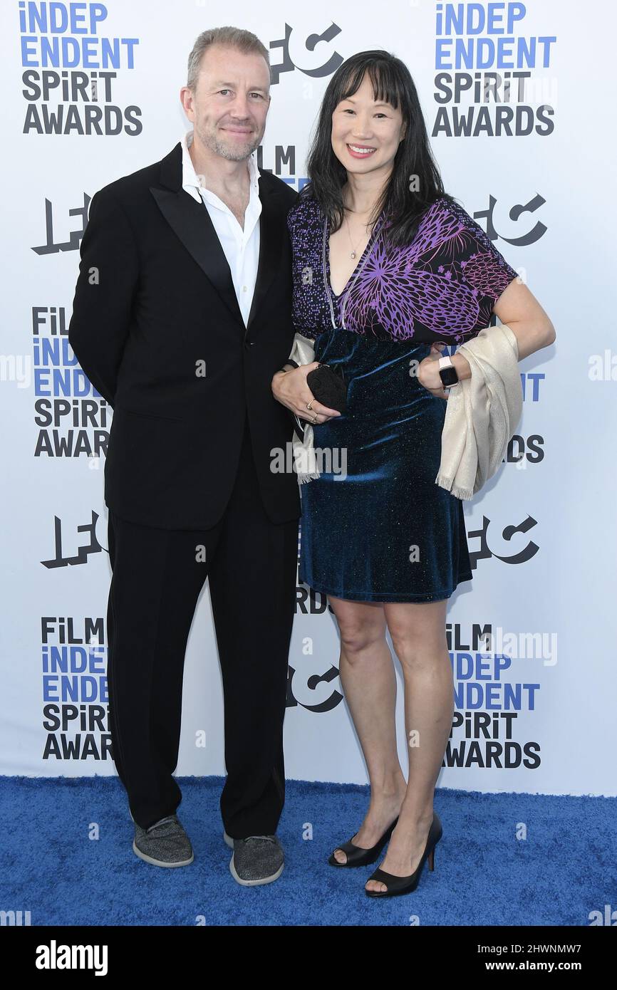 Guest and Debbie Lum arrive at the 2022 Film Independent Spirit Awards ...