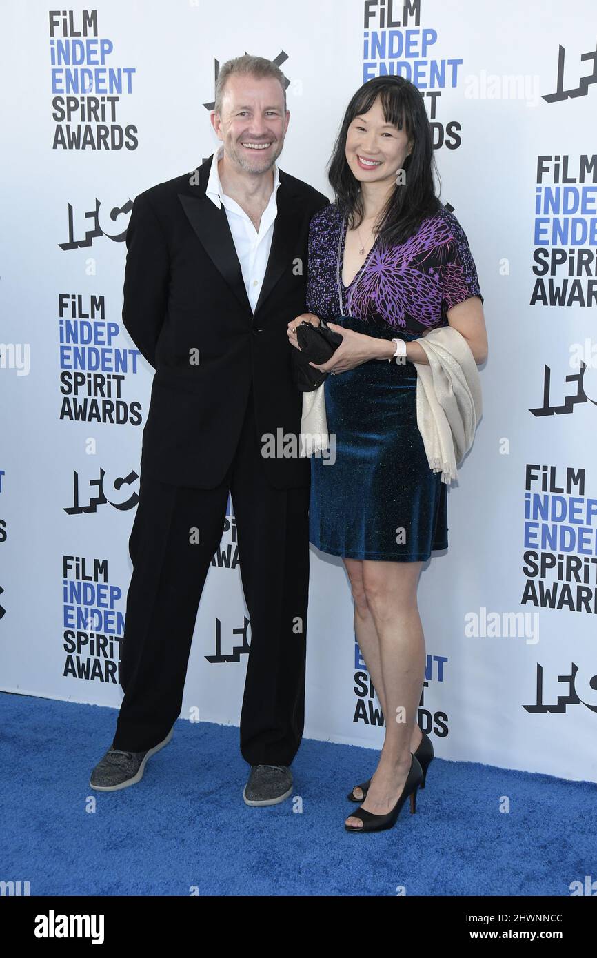 Los Angeles, USA. 06th Mar, 2022. Guest and Debbie Lum arrive at the ...