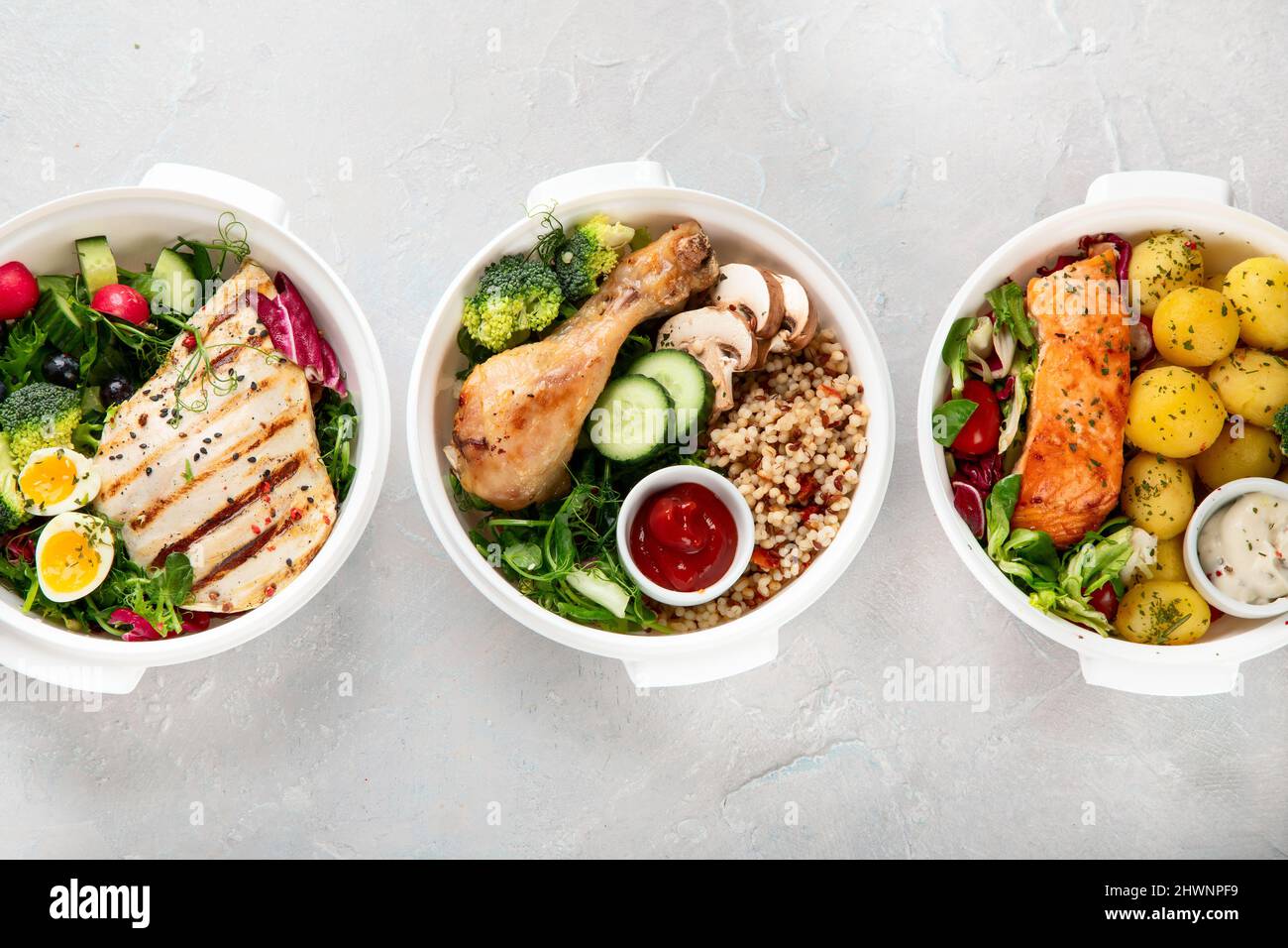 Healthy meal prep in lunch boxes on light background. Dieting eating ...