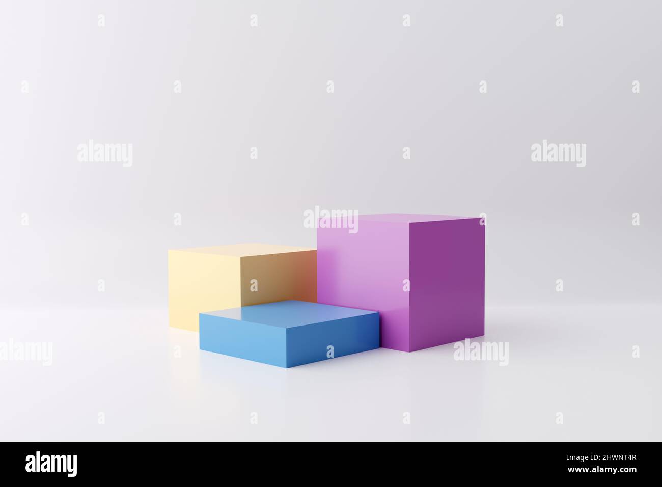 Pastel colored pedestals or platforms in cube shape with white studio ...