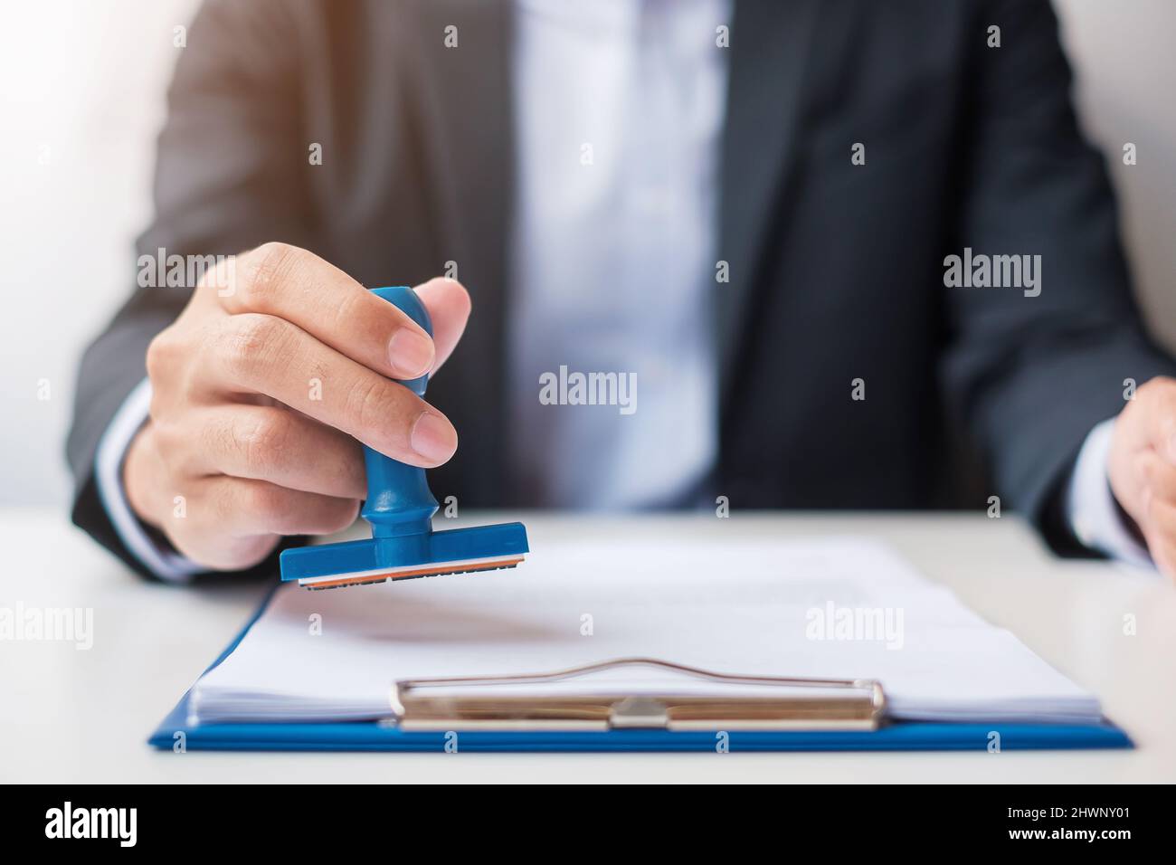 Businessman stamp during signing contract document.Business contract ...