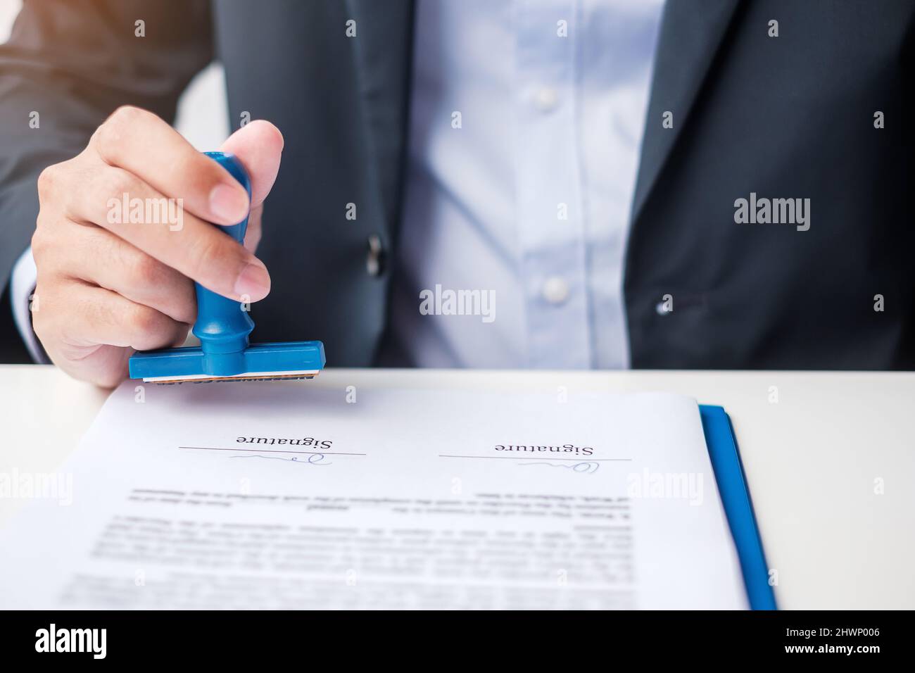 Businessman stamp during signing contract document.Business contract ...