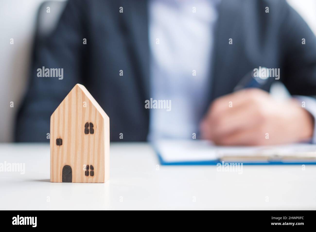 man signing home contract documents. Contract agreement, real estate ...