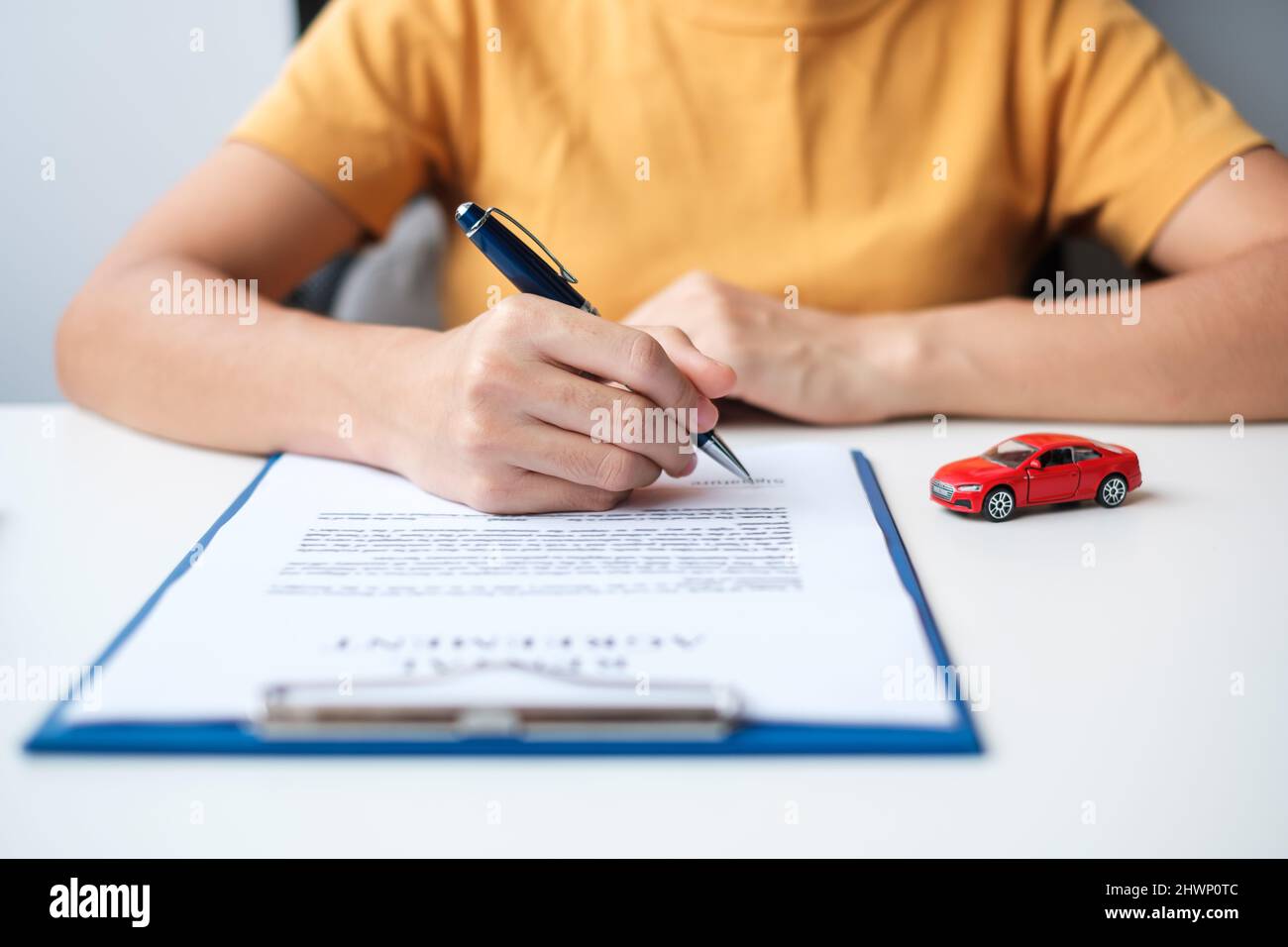 woman hand signing contract document. buy and sale, insurance, car ...