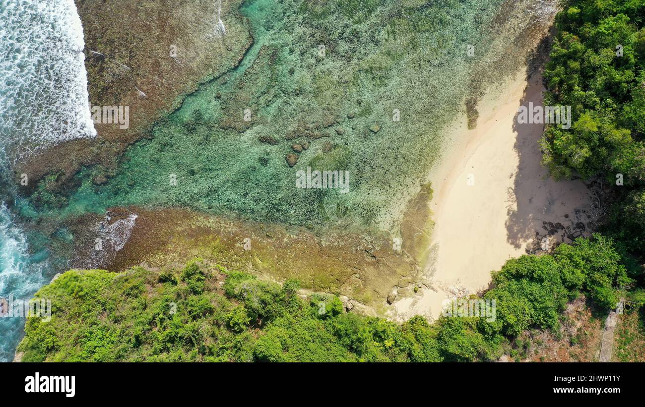 Tropical sand beach with traditional fishing boat on background azure ...