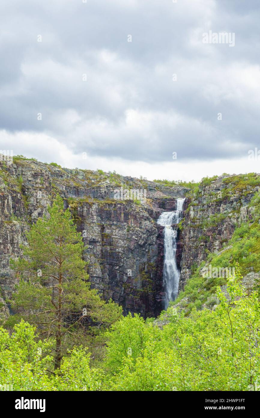 Wild terrain with a waterfall on the mountain Stock Photo - Alamy