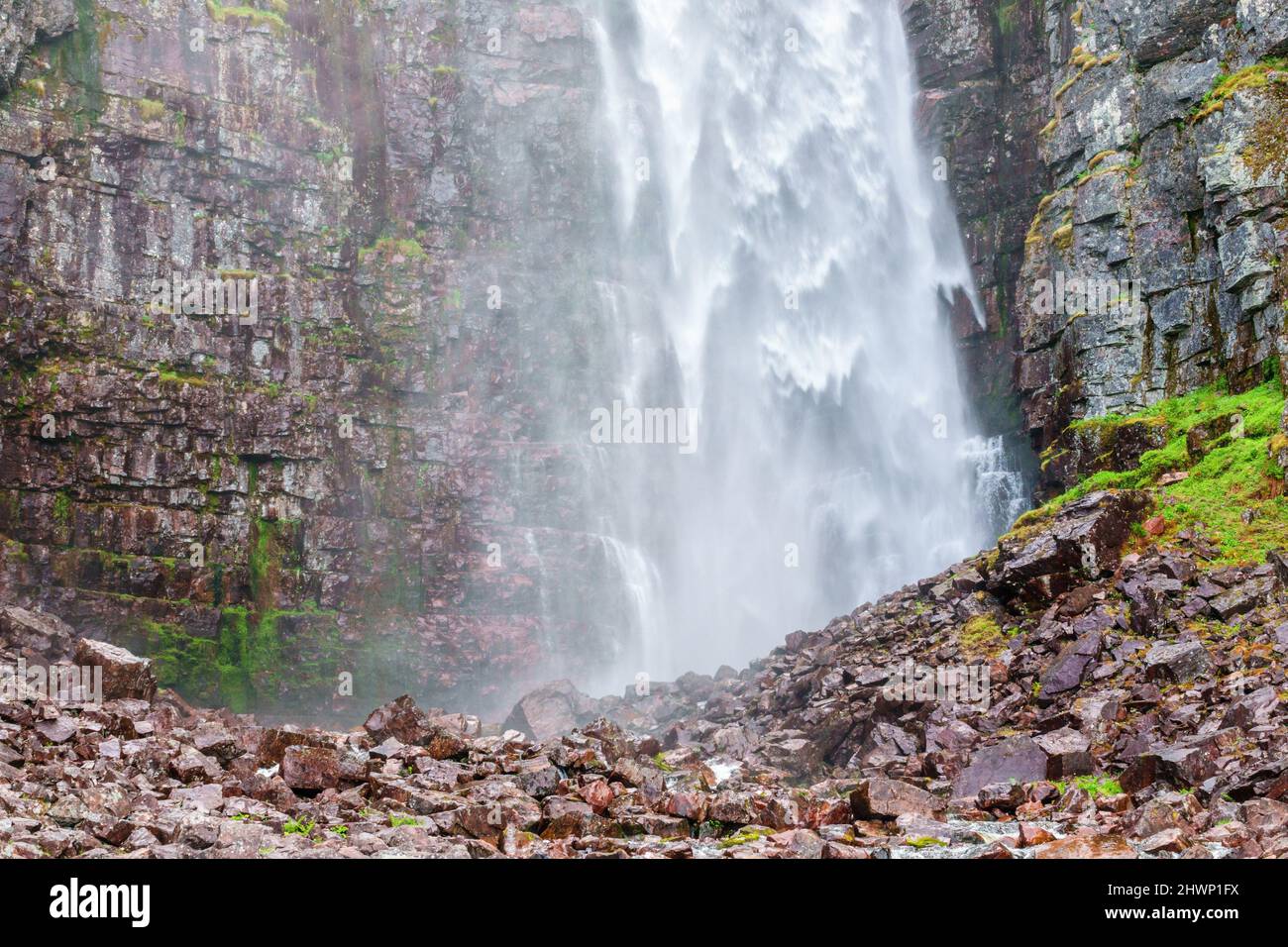 Big Waterfall with water spray at a the rock wall Stock Photo - Alamy