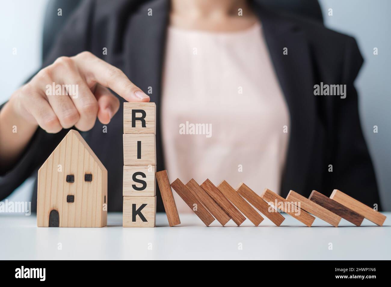 Building blocks and house and risk hi-res stock photography and images ...