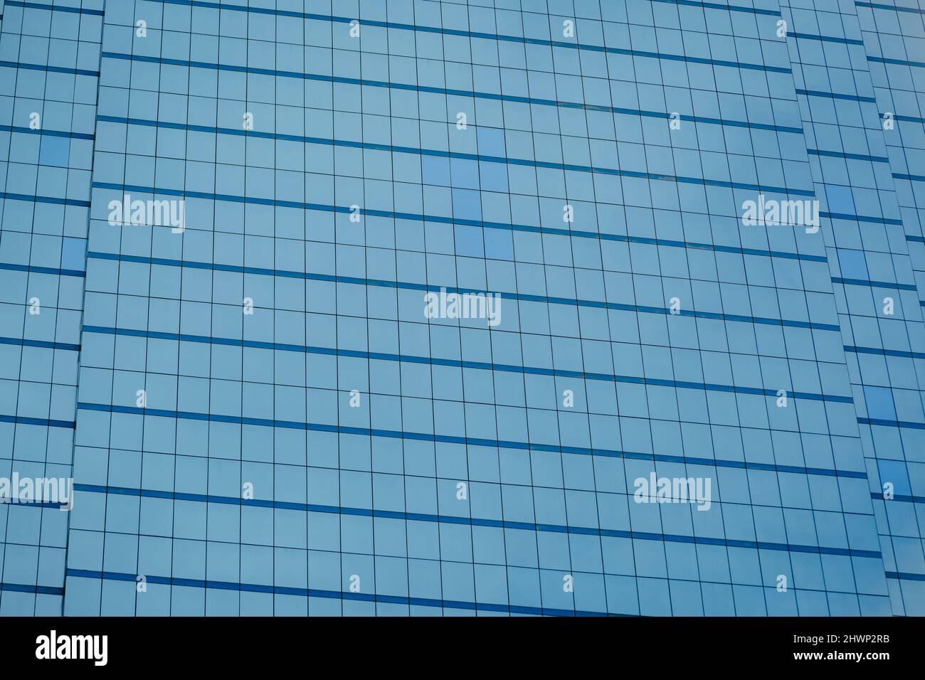 Blue glass windows of office building for background Stock Photo - Alamy